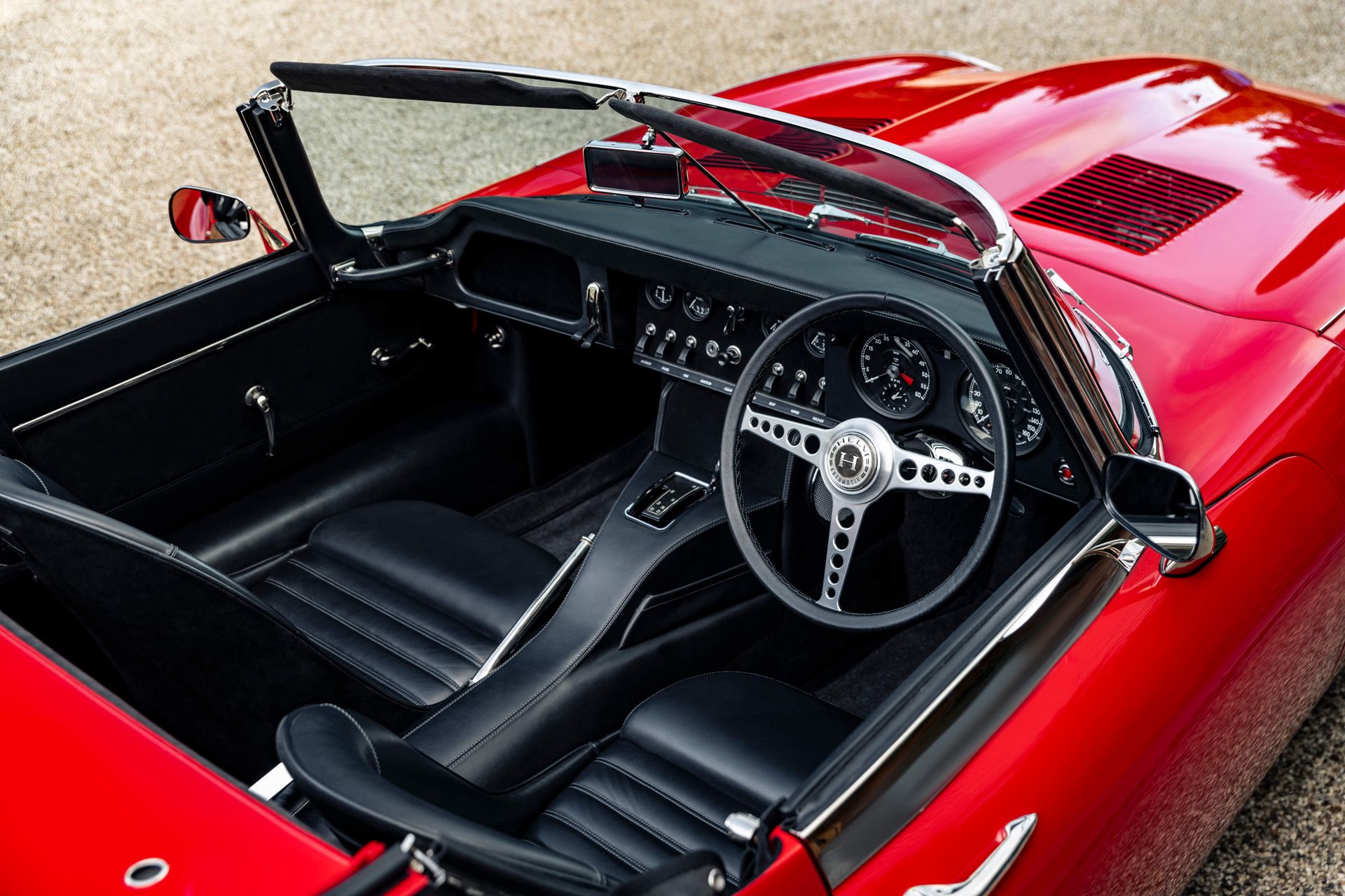 Helm’s meticulously re-imagined Jaguar E-Type features a finely crafted ...