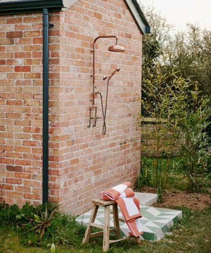 13 outdoor shower ideas for a useful, luxurious yard feature | Homes ...