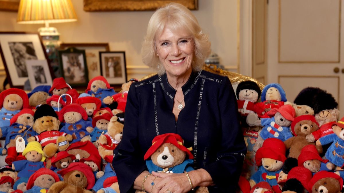 Queen Consort Camilla poses with hundreds of Paddington toys | Woman & Home