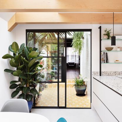 See how a glazed rear extension transformed this dingy kitchen | Ideal Home