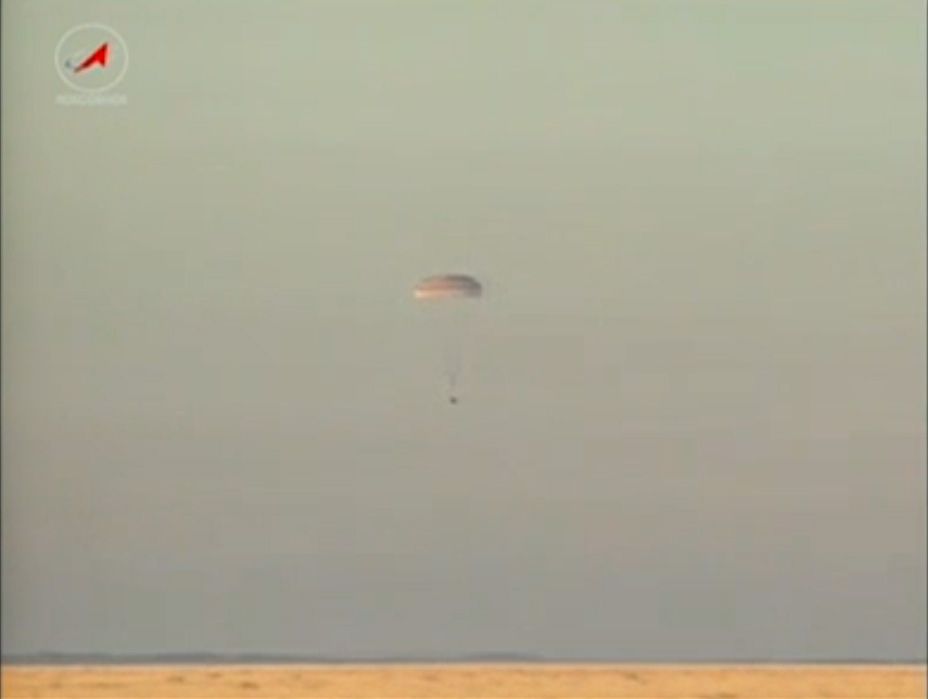 Landing Day Photos: Soyuz Capsule Returns Olympic Torch, Expedition 37 ...