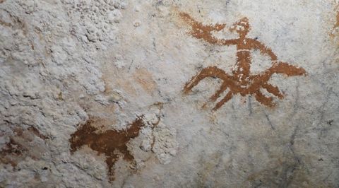 World's oldest known rock art predates modern humans' entrance into ...