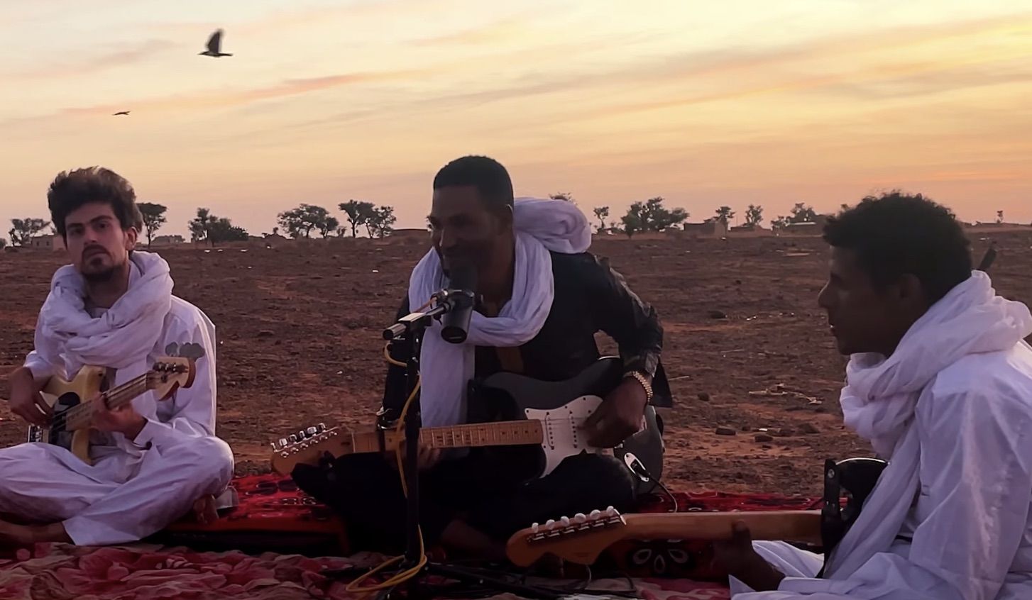 Watch Mdou Moctar play a stunning early morning set on the banks of the ...