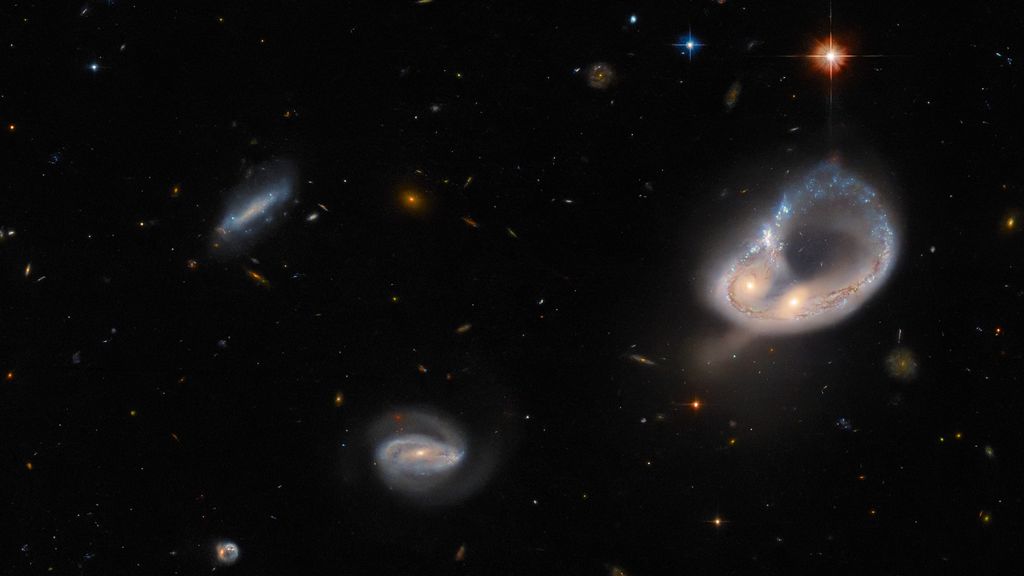 Magnificent ring of stars captured by Hubble is the result of two ...