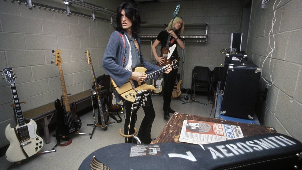 “With a through-neck, two DiMarzio Super Distortion pickups, an onboard ...