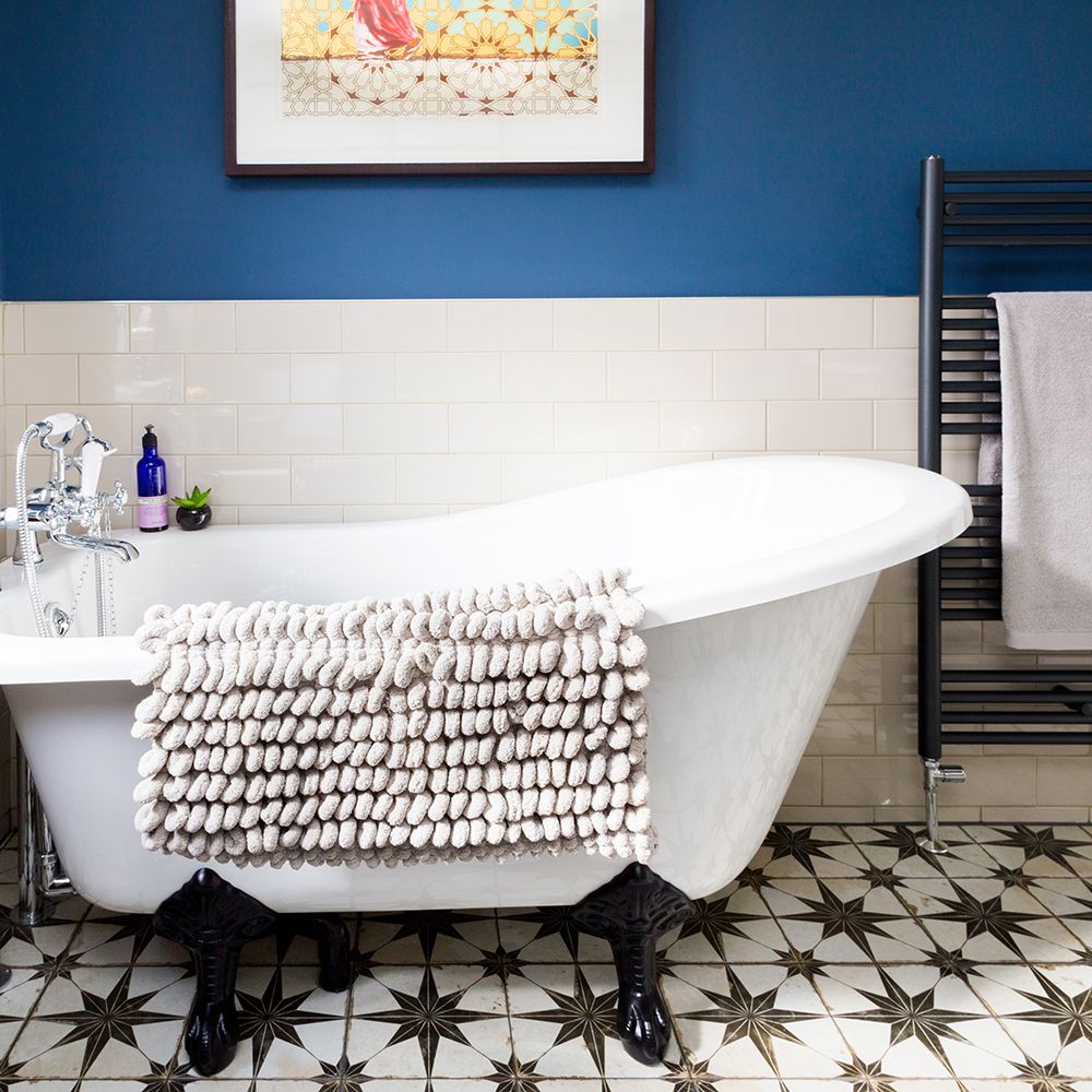 Traditional bathroom makeover with roll top bath, blue walls and star ...