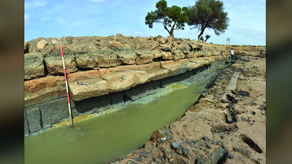 Ancient sacred pool lined with temples and altars discovered on ...