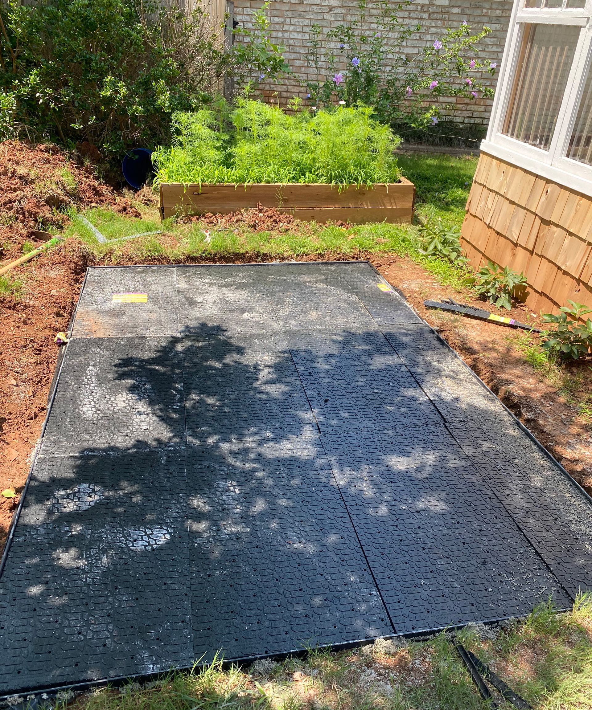 How to lay a brick patio in 10 easy steps | Real Homes