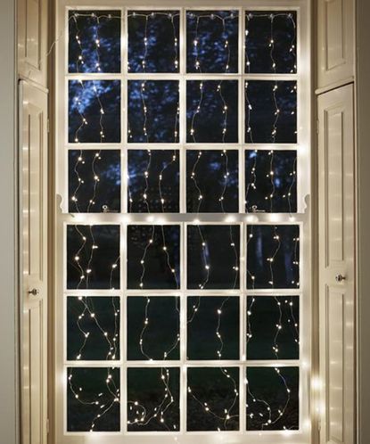 Christmas window lighting ideas – 14 ways to light casements | Real Homes