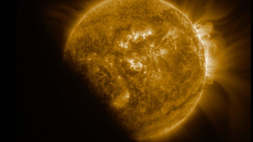 Moon blocks satellite views of sun before lunar eclipse photo of the ...
