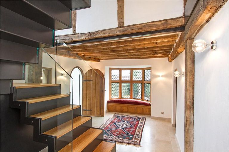 The sprawling country house in Surrey hailed as 'the best of the best ...