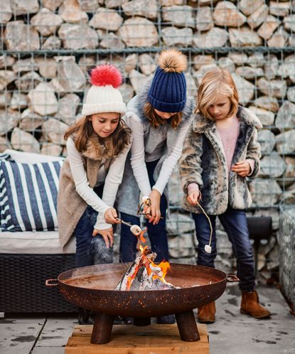 Fire pit ideas: 20 ways to cozy up after dark | Gardeningetc