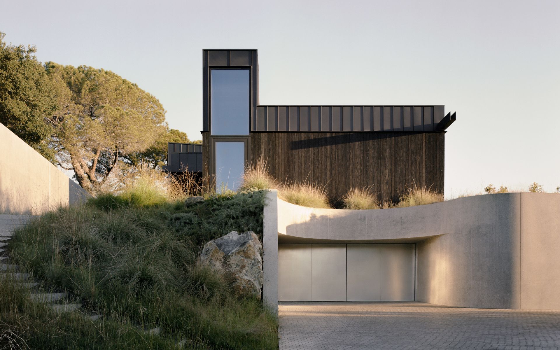 Tour this hilltop California home built seamlessly into the landscape ...