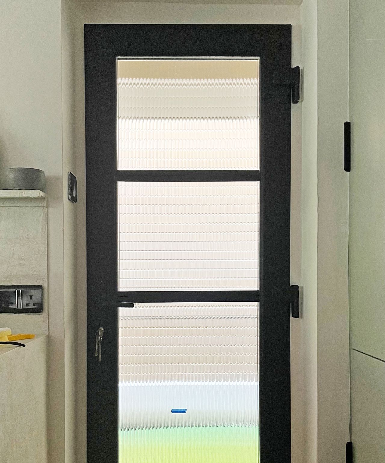 How to upgrade a uPVC door with paint and faux Crittall detail | Real Homes
