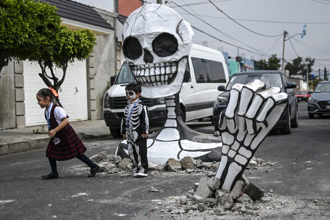 Giant skeleton sculptures 'rise up' in Mexico City | Creative Bloq