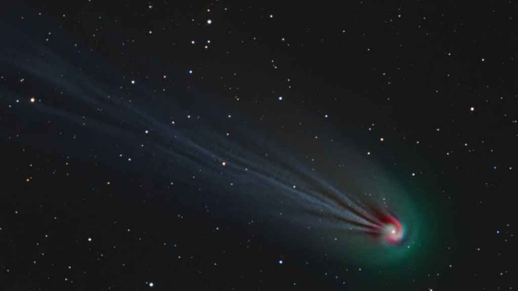 Explosive, green 'devil comet' has hidden spiral swirling around its ...
