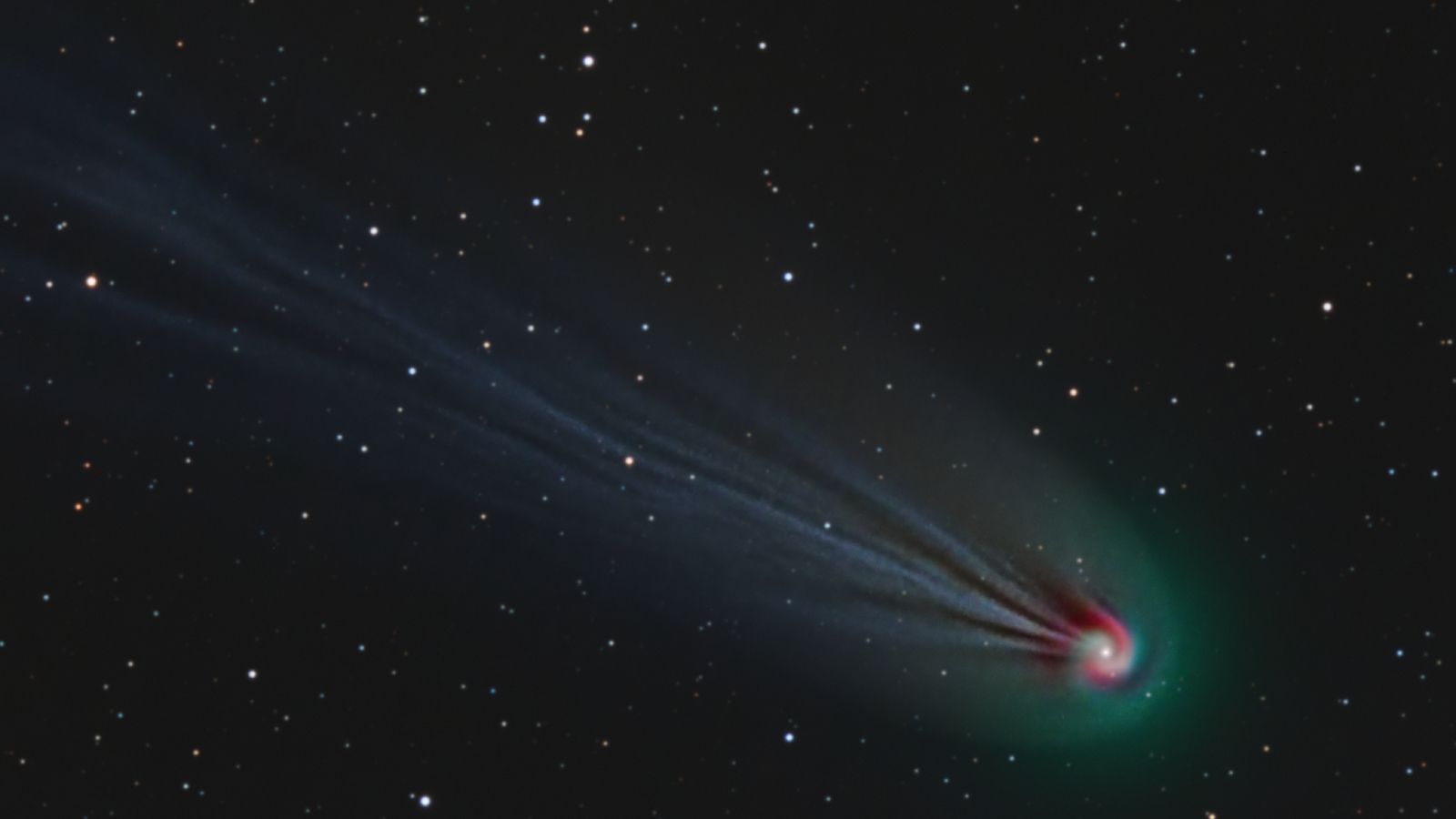 Explosive, green 'devil comet' has hidden spiral swirling around its ...