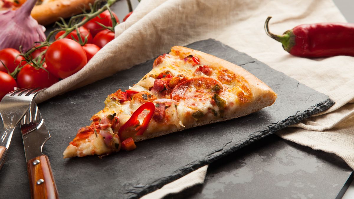 How to reheat pizza in the oven and make it taste fresh | Tom's Guide