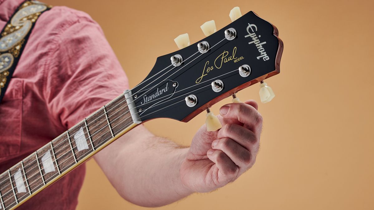 How to tune an electric guitar with a tuner | Guitar World