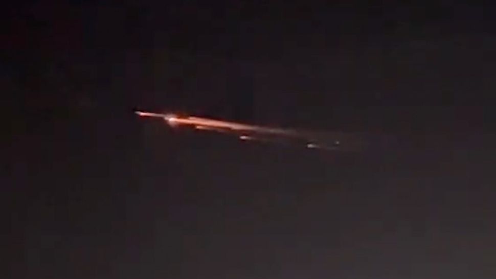 See a dead Chinese satellite burn up as a brilliant fireball in the ...
