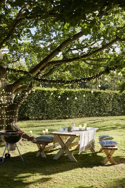 The best ways to hang string lights in your backyard