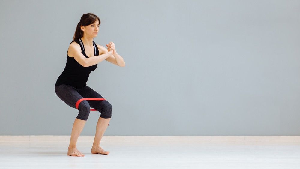 Essential Exercises To Help Manage Back Pain | Coach