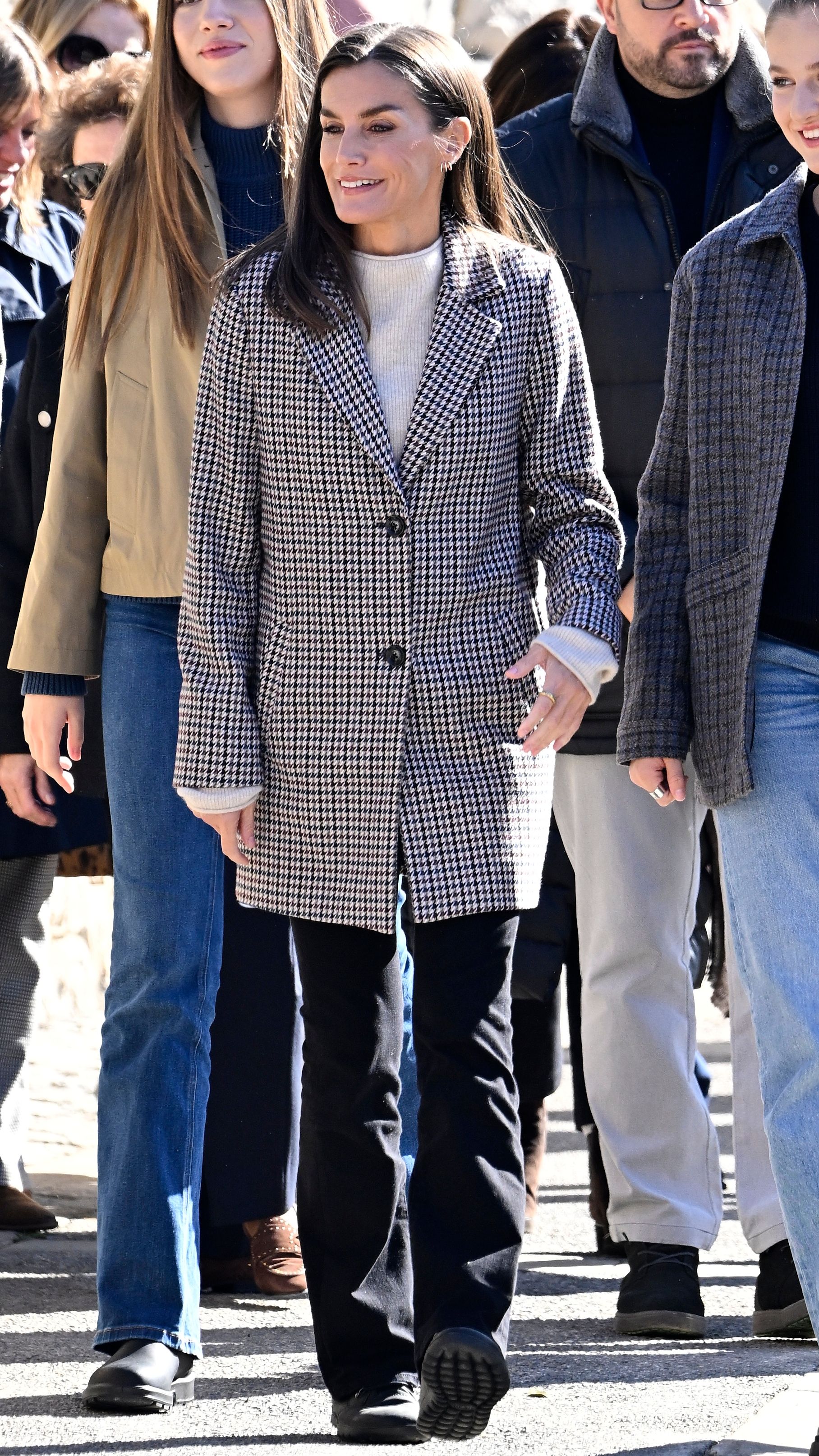 Queen Letizia's checked coat, bootcut jeans and boots tick all our ...
