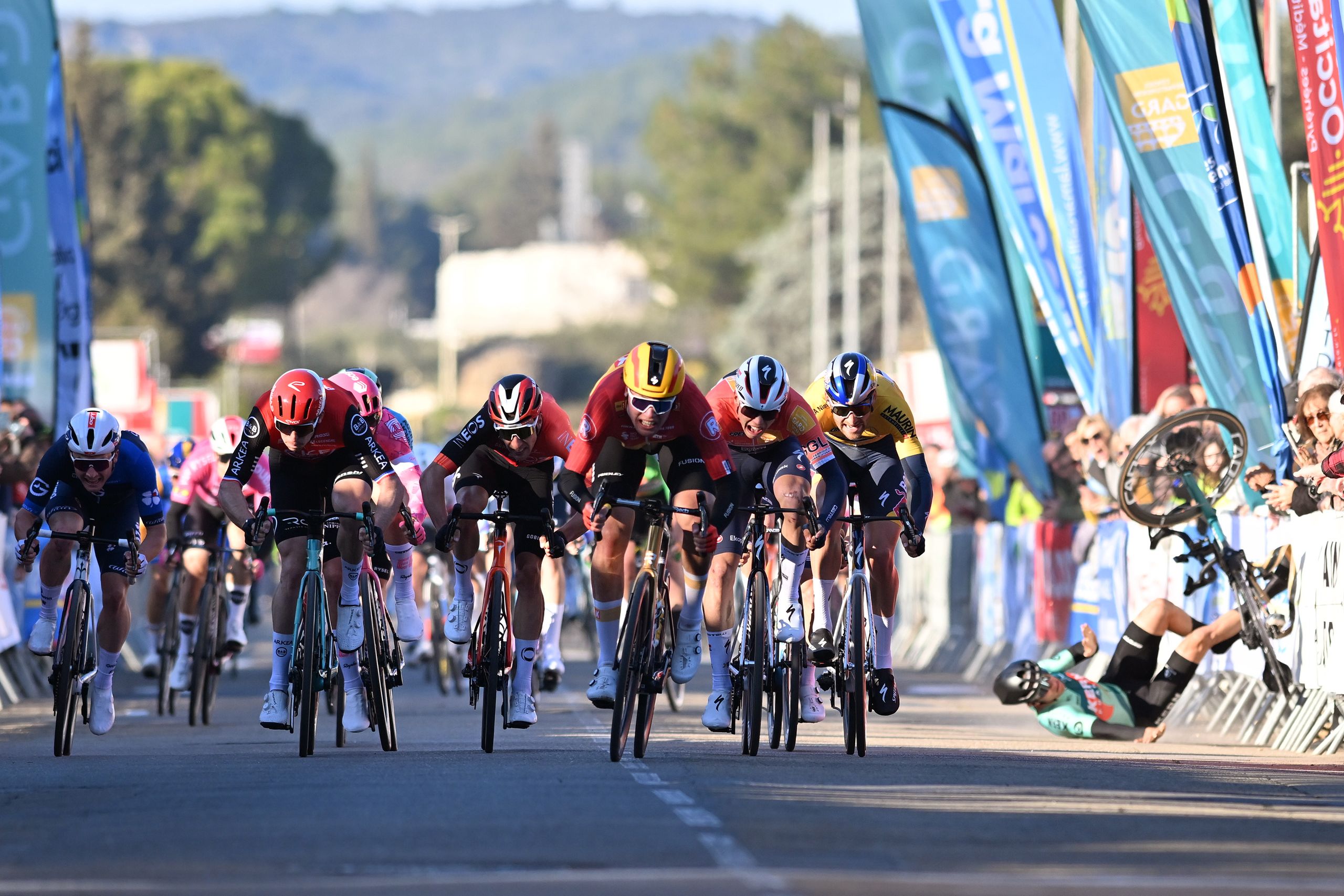 Car drives towards peloton leading to pile-up in French stage race ...