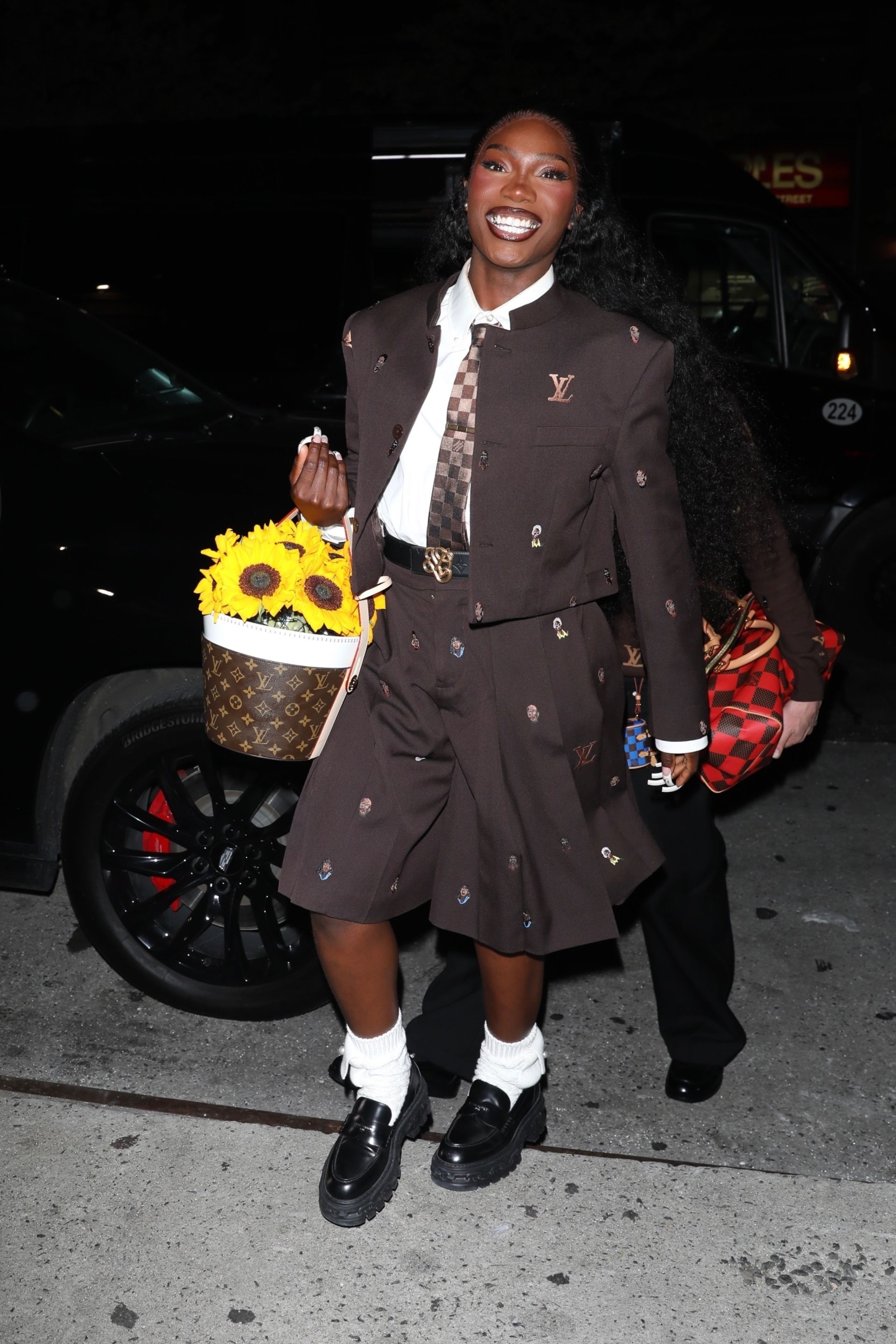 Doechii Aces the 2025 Met Gala Dress Code Early in a Louis Vuitton Suit ...