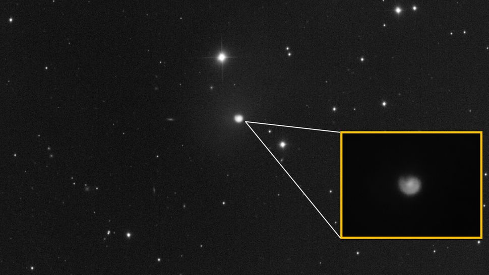 City-size, cold-volcano comet transforms into a glowing 'snail shell ...