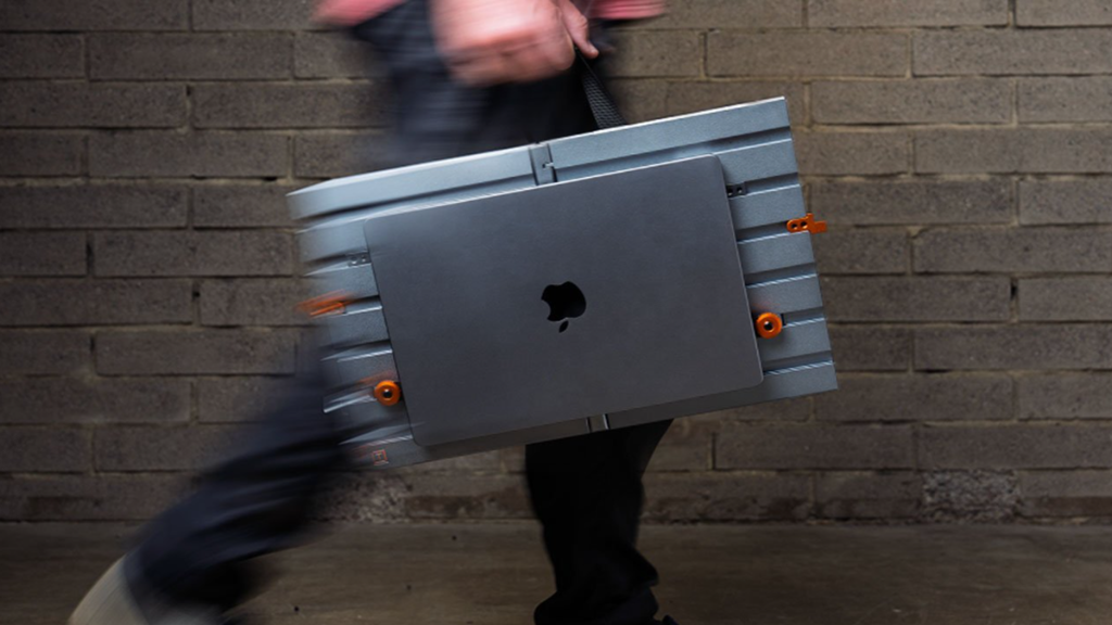 This sleek aluminum workstation folds into your backpack, yet your ...