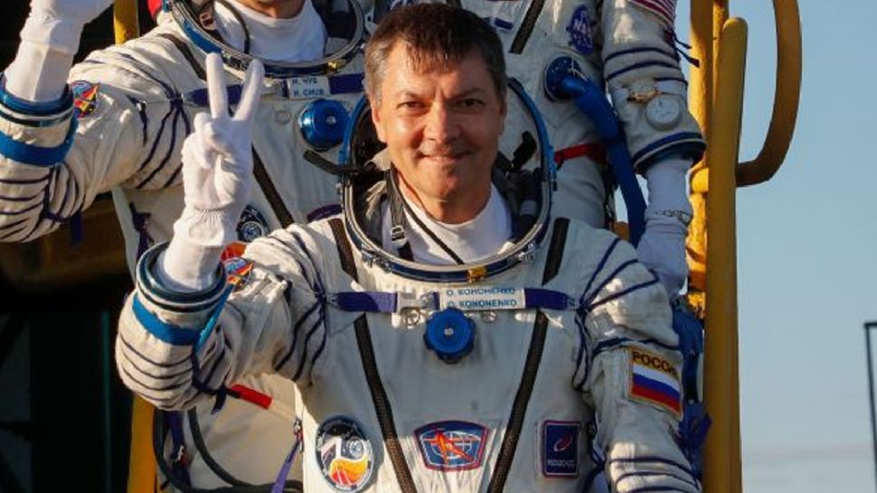 Russian cosmonaut returns to Earth after completing record-breaking 1 ...