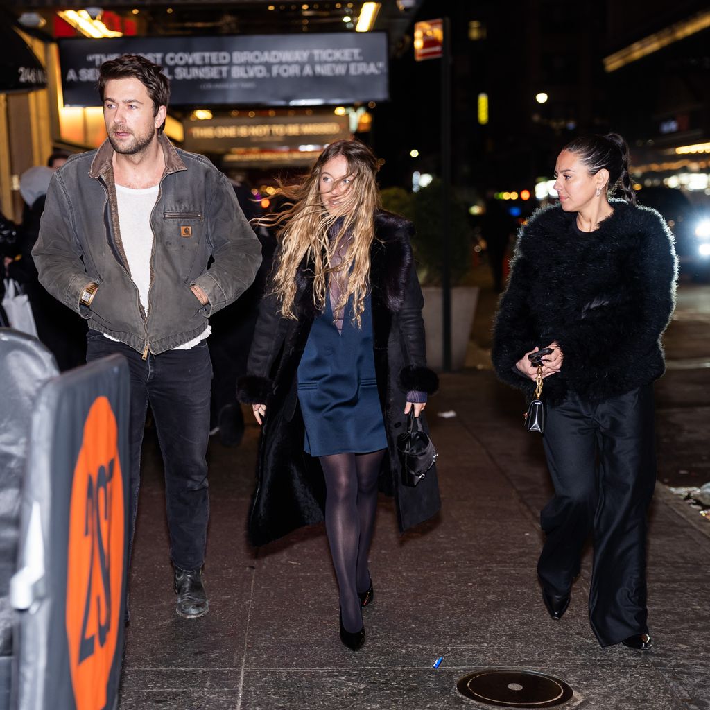 Sydney Sweeney Winterizes a Plunging Mini Dress With a Sheer Turtleneck ...