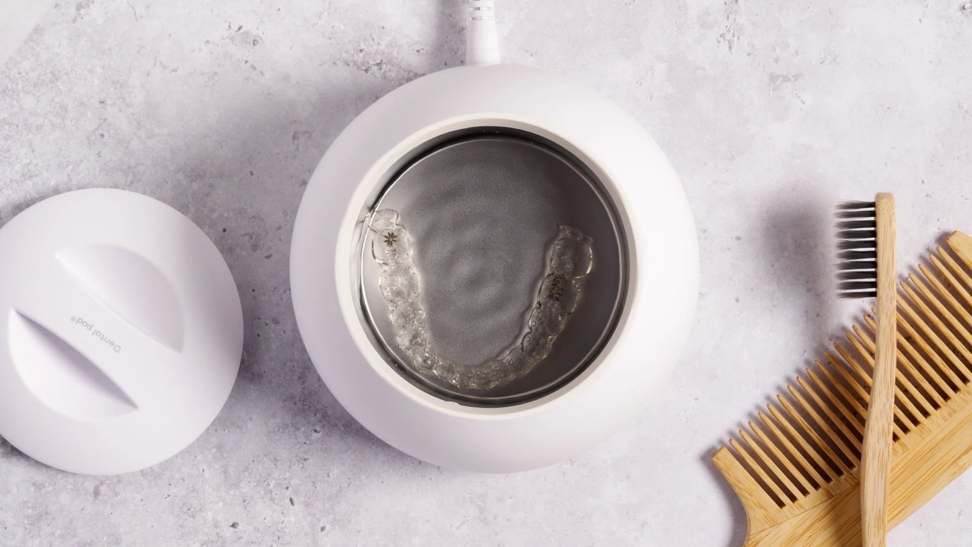 I’ve worn dental retainers for over a decade, and this ultrasonic pod ...