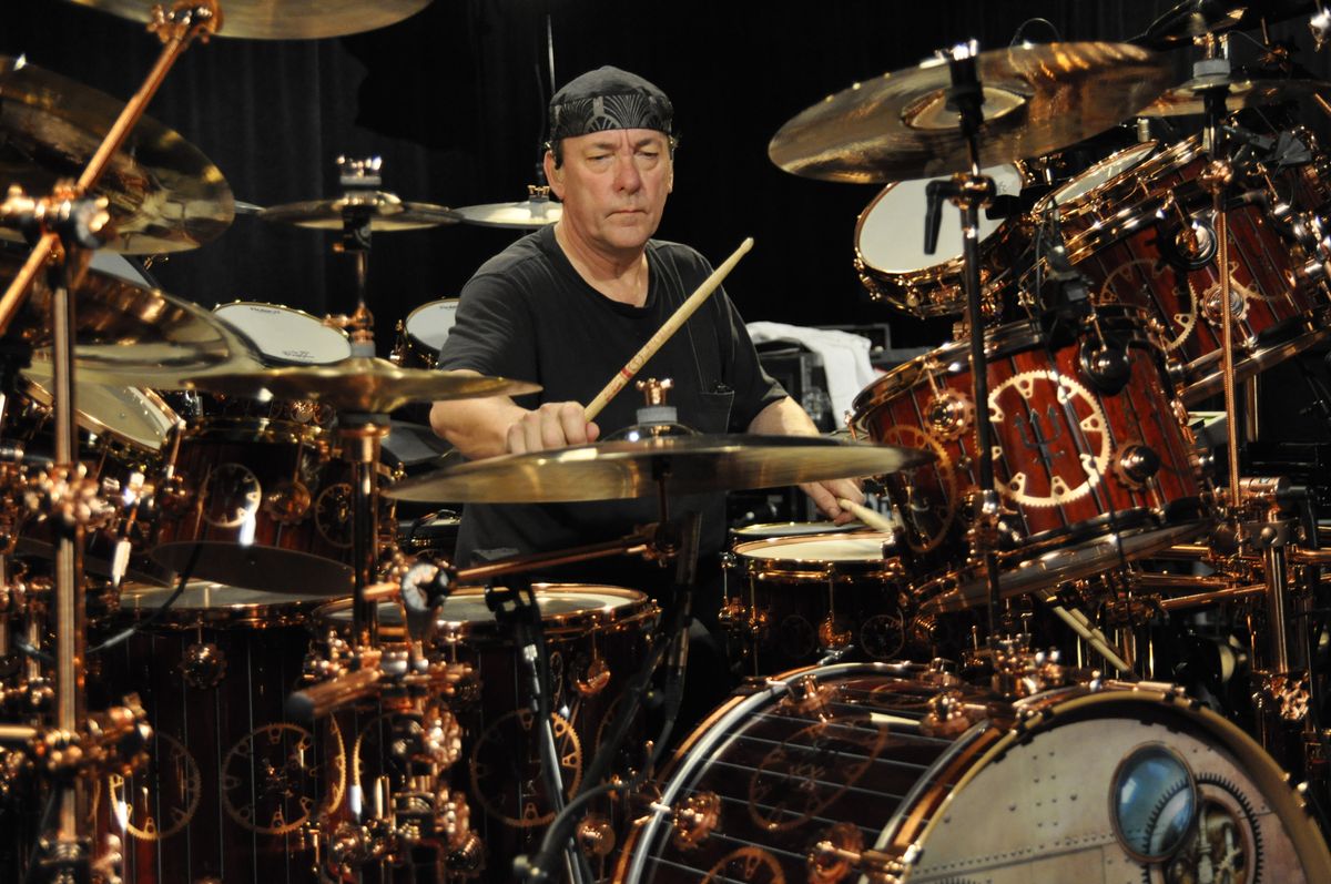 Win signed Neil Peart DVD and Remo head | MusicRadar