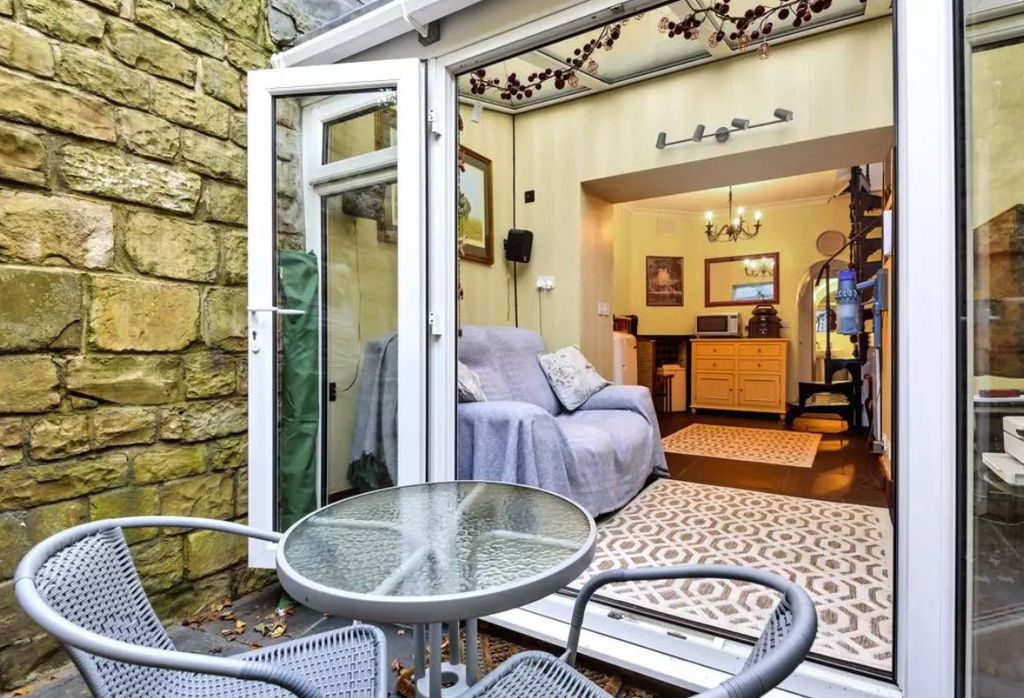 A tiny one-bed Georgian gatehouse with underground living quarters and ...