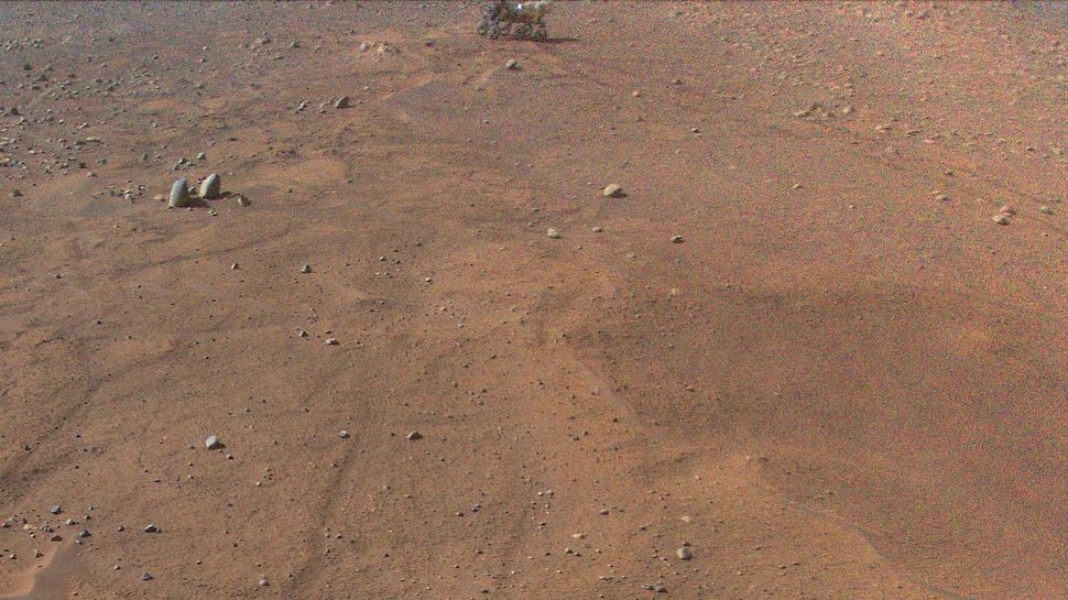 Mars helicopter Ingenuity spies Perseverance rover during 54th flight ...