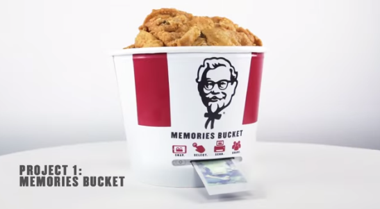 This new KFC fried chicken bucket also prints photos, so you can ...