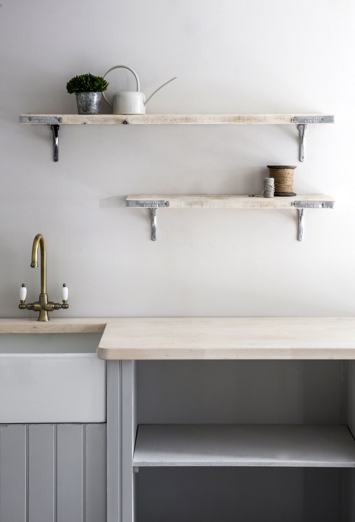 How To Put Up A Shelf With Brackets Real Homes