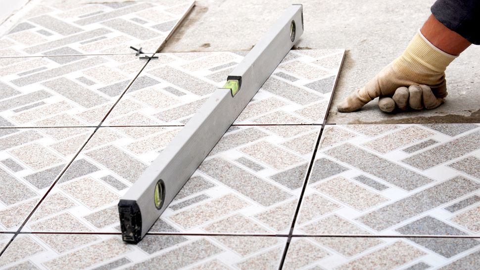 Tiling an uneven floor tips to achieve a flat and level surface ...