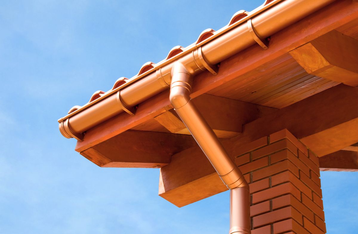 What are rain chains and how do they compare to downspouts? | Homebuilding