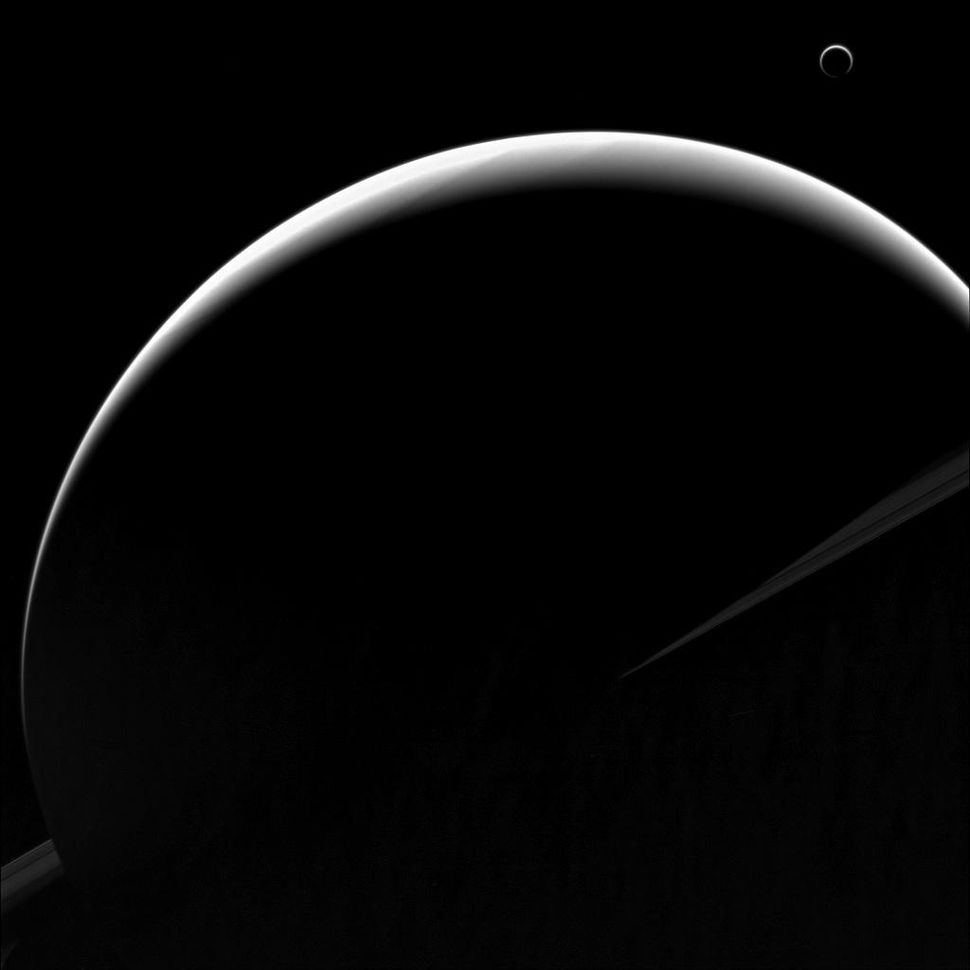This Amazing NASA Photo of a Crescent Saturn and Titan Is a Must-See ...