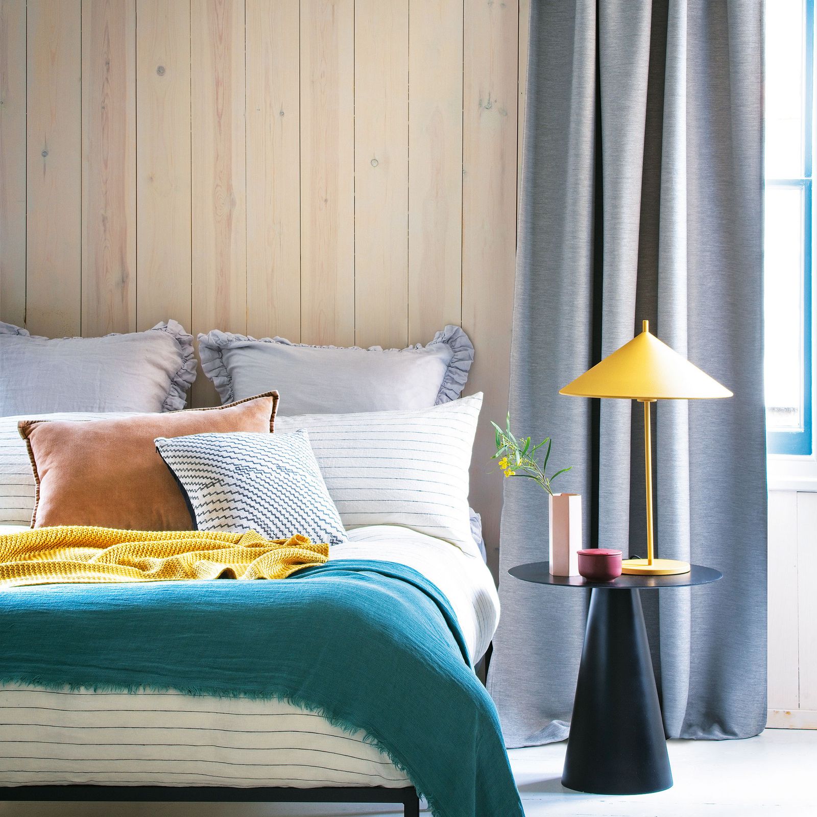 Should bedroom curtains hang over radiators? | Ideal Home