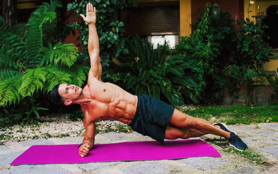 I did side planks with leg raises every day for a week to strengthen my ...