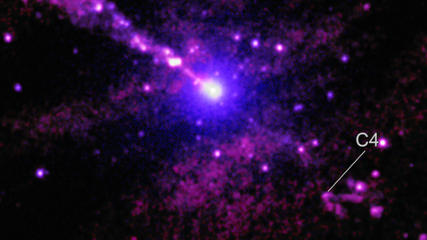 Galaxy-size jet from monster black hole blasts mystery object in deep ...