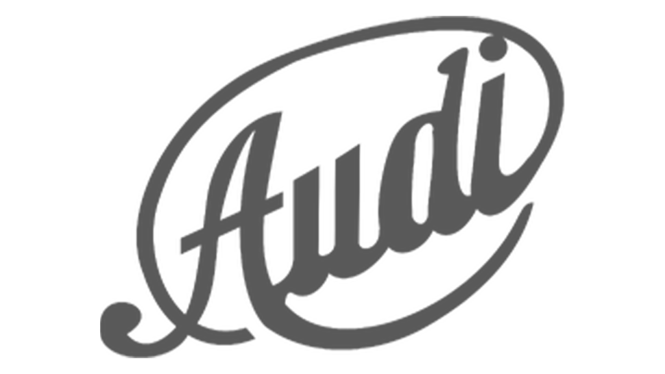 The history of the Audi logo: from script font to mergers and rings ...