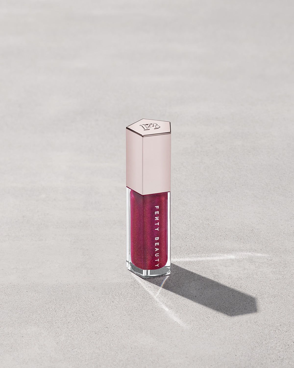 Fenty Beauty Has Officially Restocked Gloss Bomb Universal Lip Luminizer Fuchsia Flex | Marie Claire