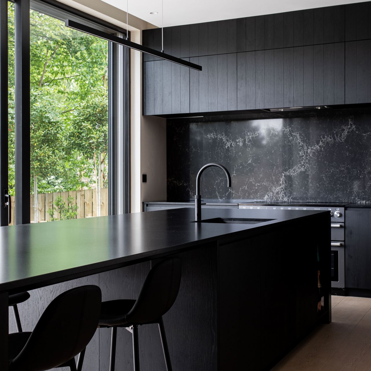 The dark kitchen trend 'simply oozes high-end cosiness' | Ideal Home