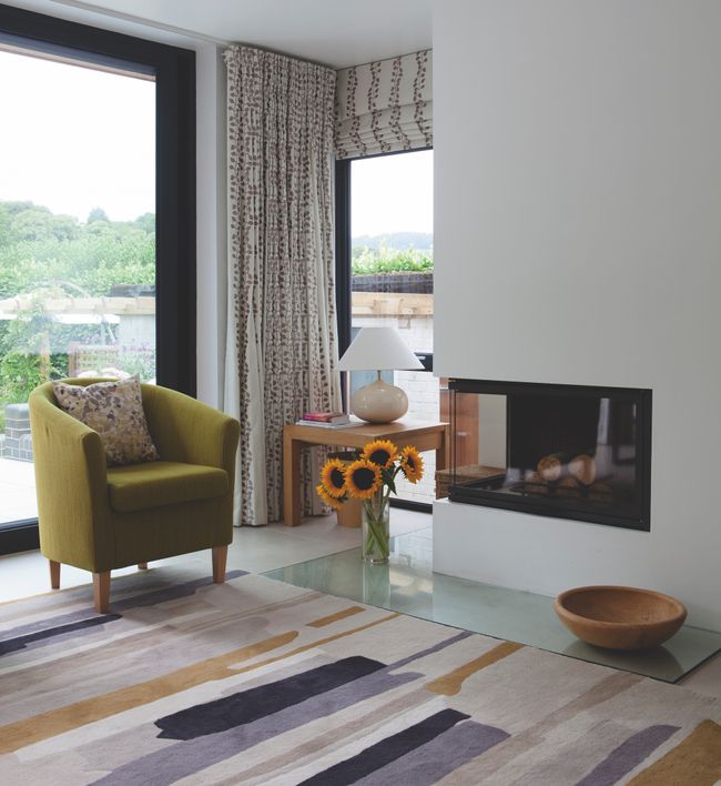 Corner log burner ideas for a cosy living space | Homebuilding