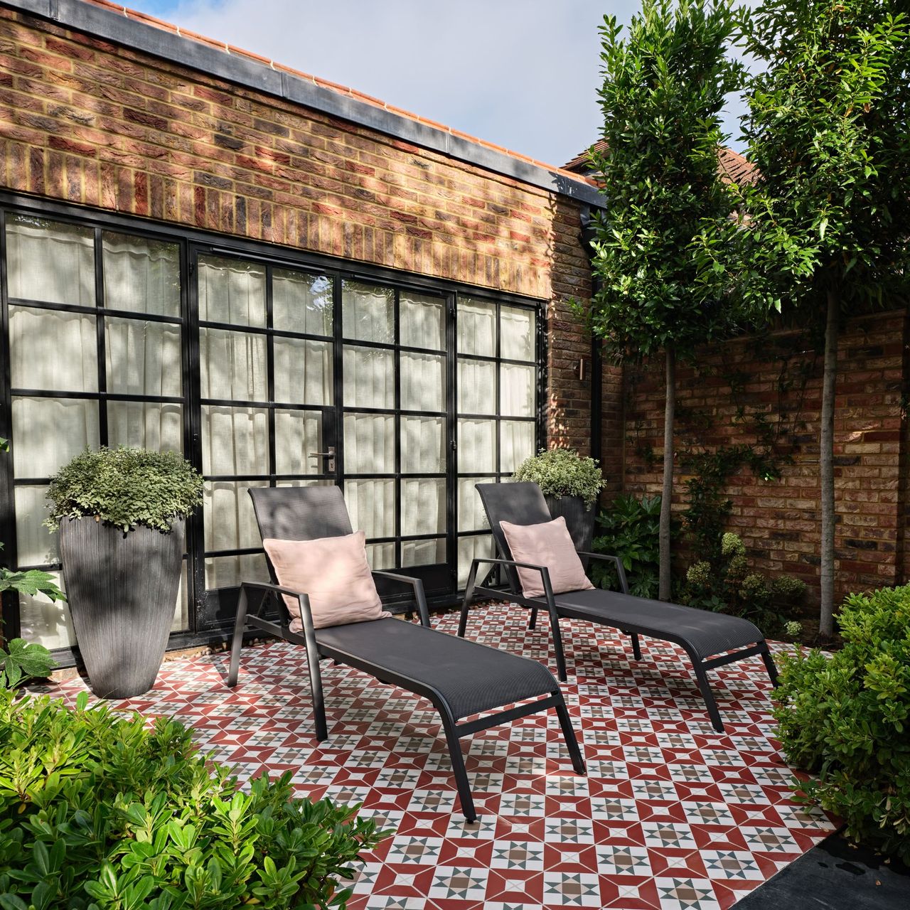 How to use tiles to elevate a garden for summer | Ideal Home